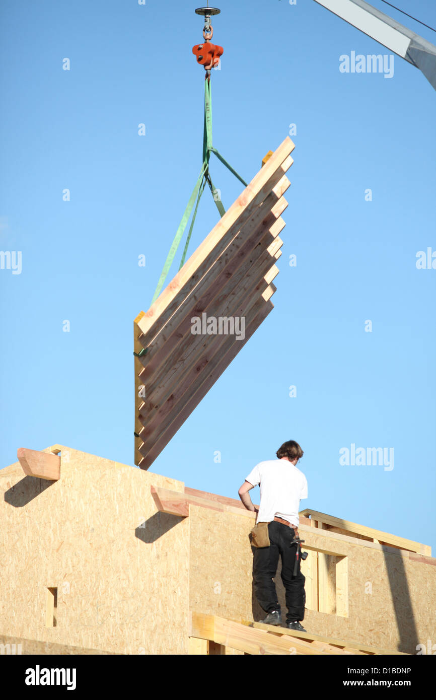 Construction of a wooden building Stock Photo - Alamy