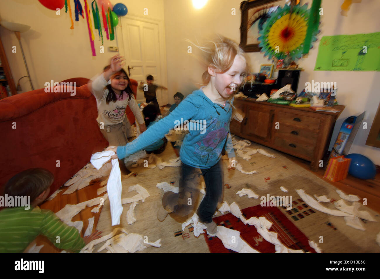 Berlin, Germany, children playing with paper Stock Photo - Alamy