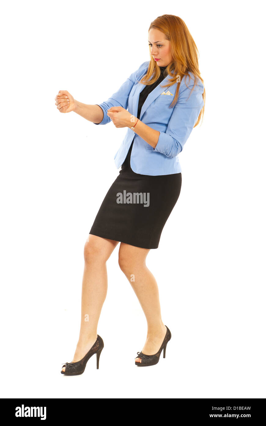 Business woman pulling something imaginary isolated on white background ...