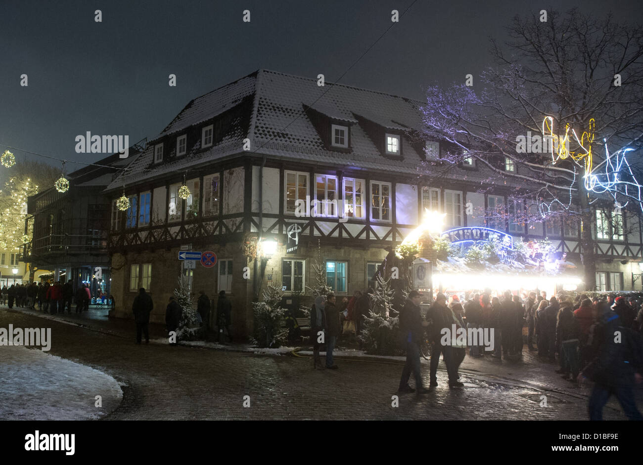 People visit the Christmas market in Hanover, Germany, 12 December 2012 ...