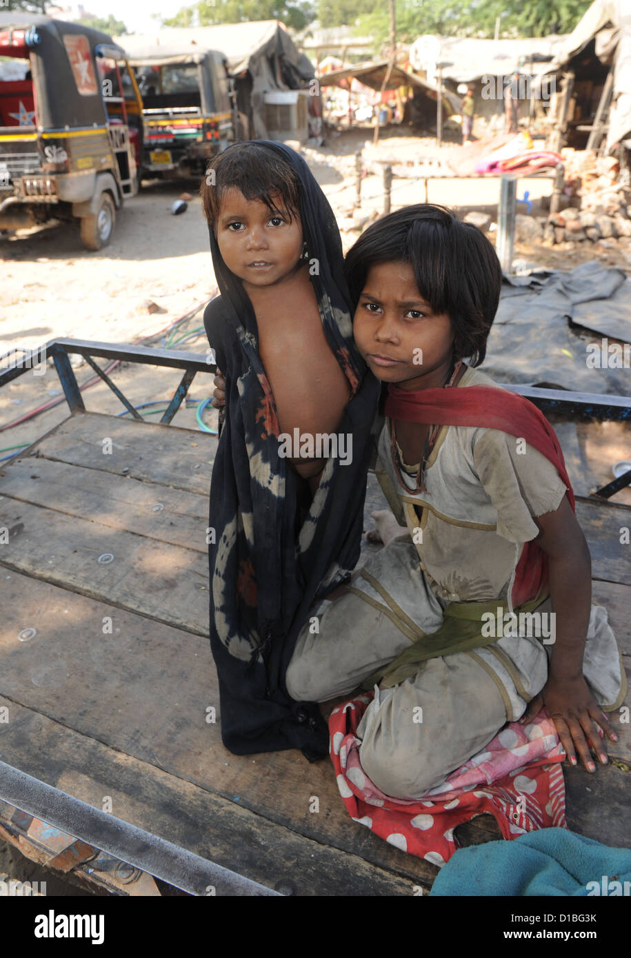 Two children in the slums hi-res stock photography and images - Alamy
