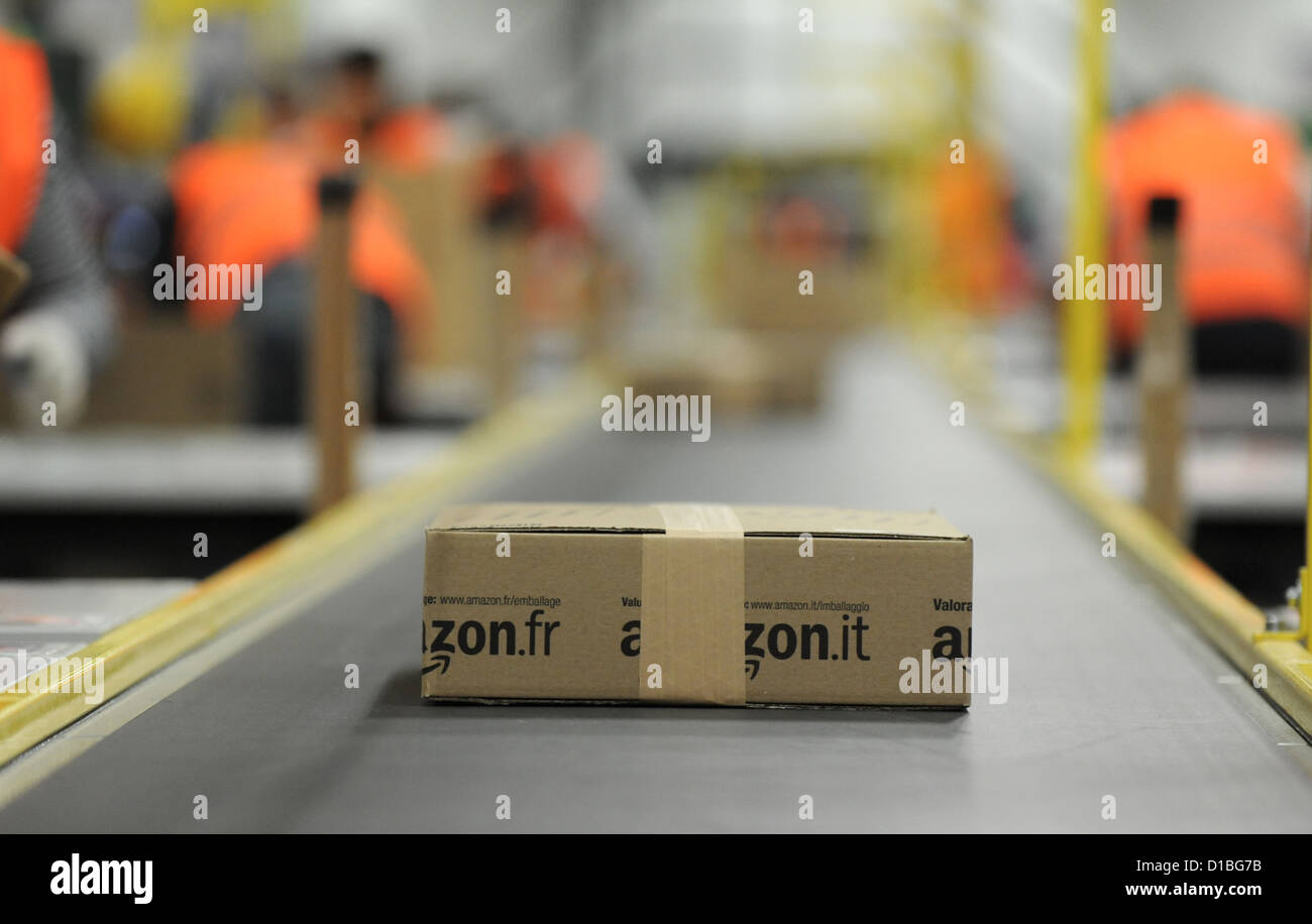People work in the shipping department in the Amazon Logistics Center ...