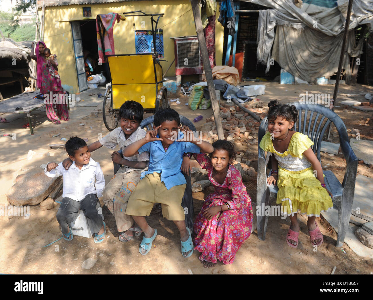 Children sit in front of huts in a slum in Jaipur, India, 09 November ...