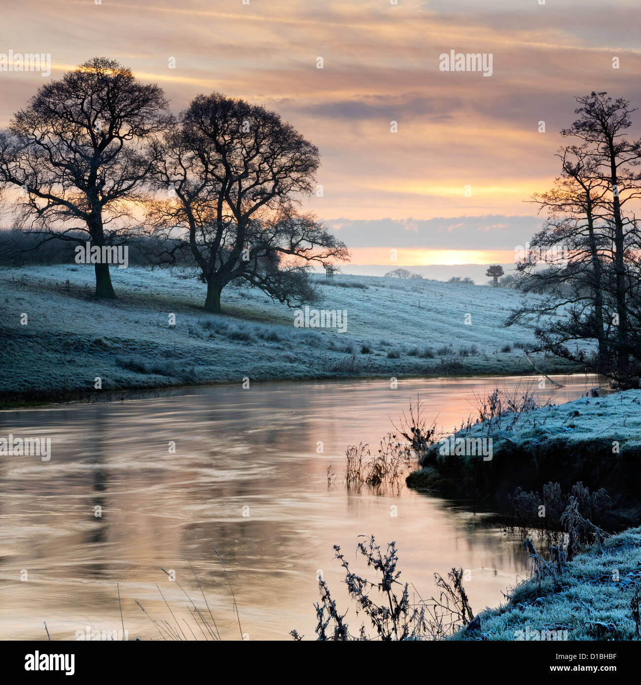 The flooded river Derwent at Howsham Bridge, north Yorkshire, at sunset ...