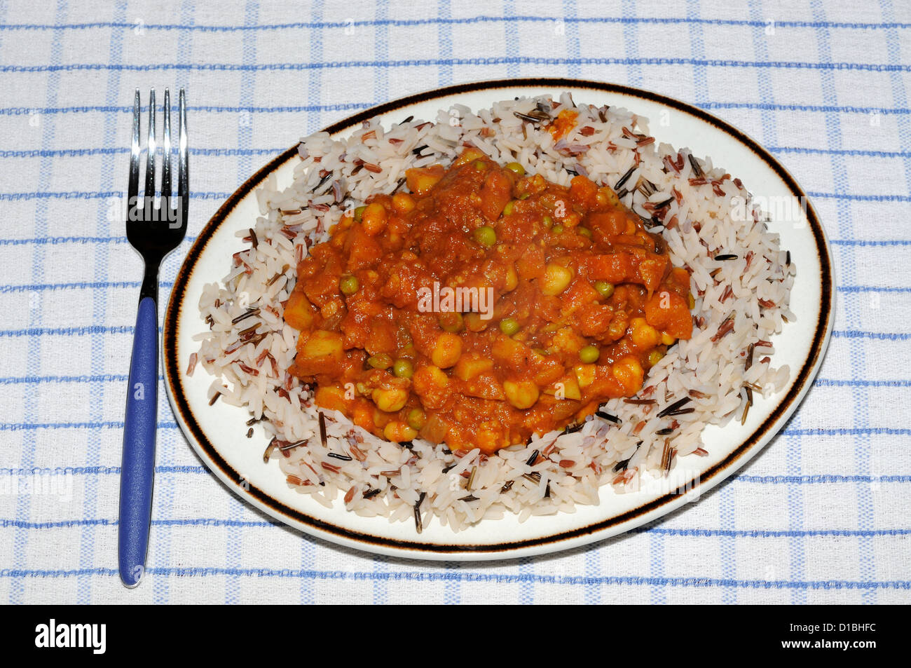 Vegetarian Moroccan stew with rice Stock Photo - Alamy