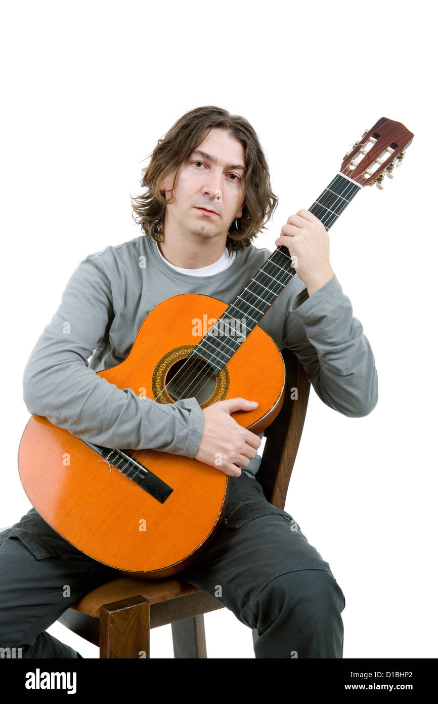 musician plays an acoustic guitar, isolated Stock Photo - Alamy