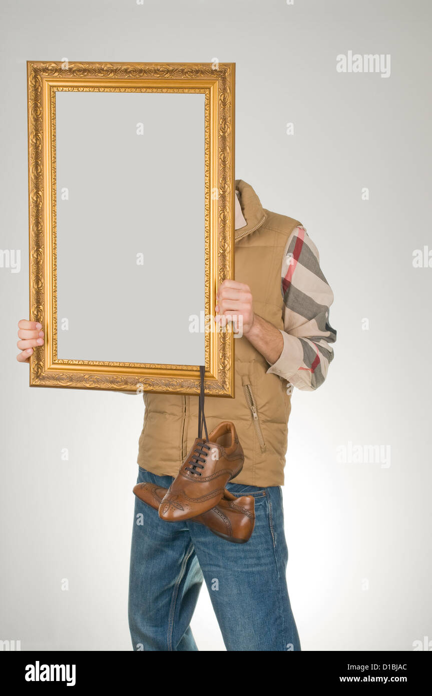 Man holding empty frame Stock Photo - Alamy