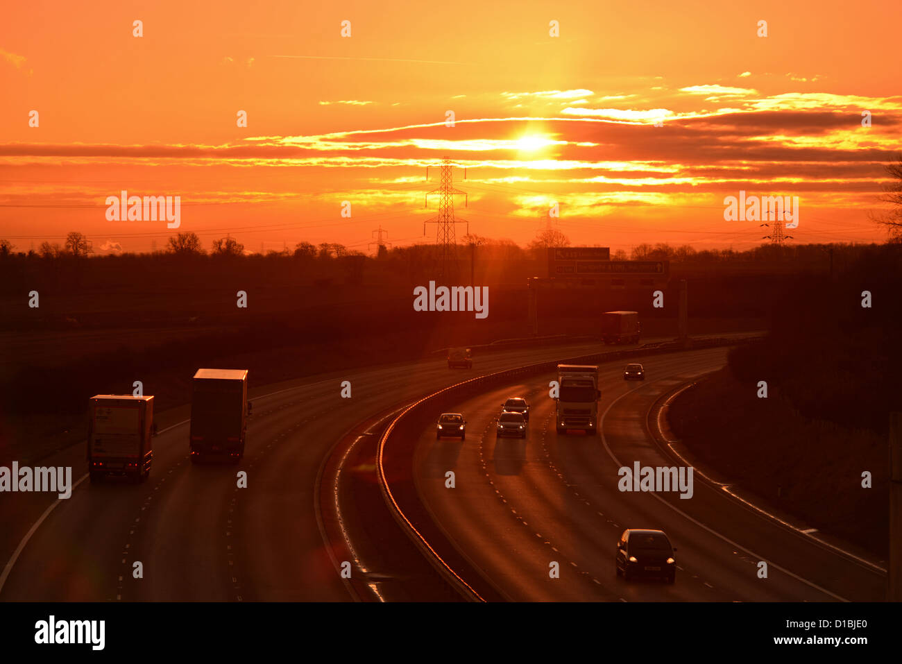 traffic travelling on the A1/M motorway at sunrise leeds uk Stock Photo ...
