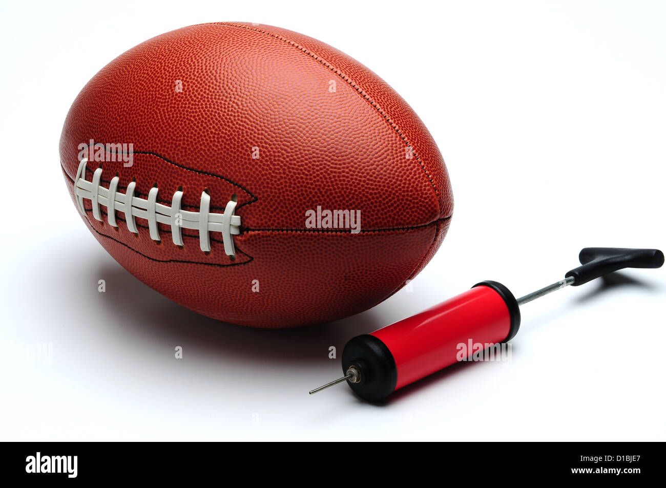 American football and pump Stock Photo - Alamy