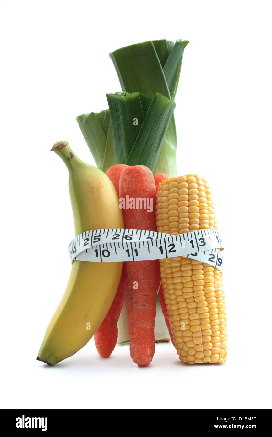 Fruit and vegetables with a tape measure around them Stock Photo - Alamy