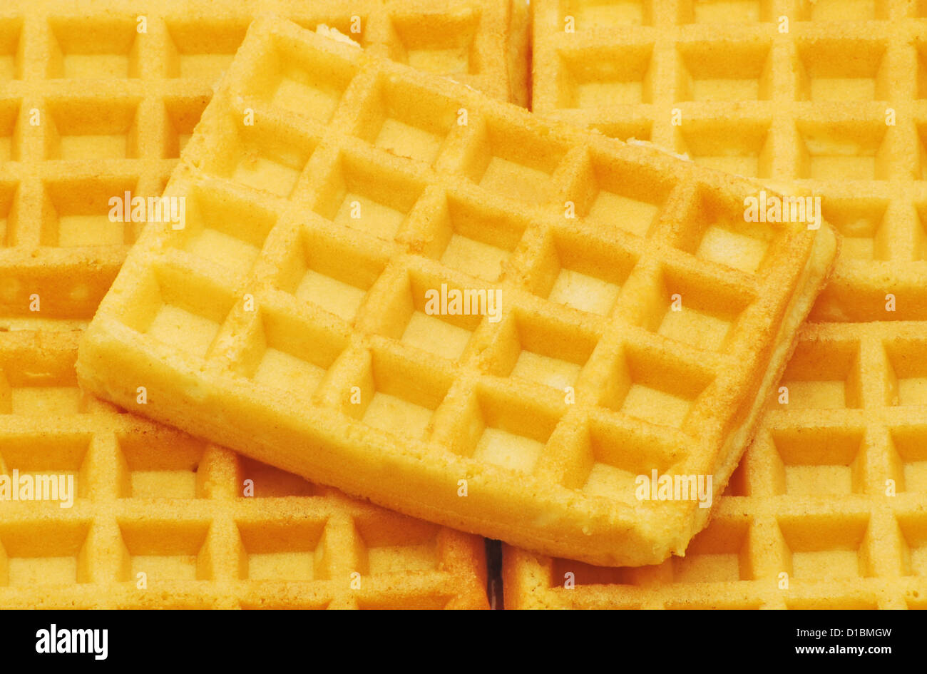 Yellow fresh wafers on background Stock Photo - Alamy