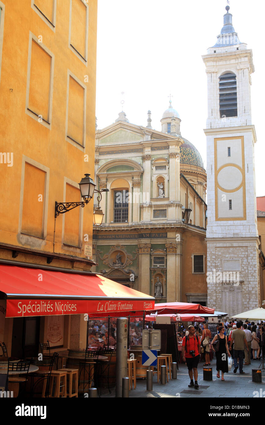 Typical architecture in the old town of Nice city with the Sainte ...