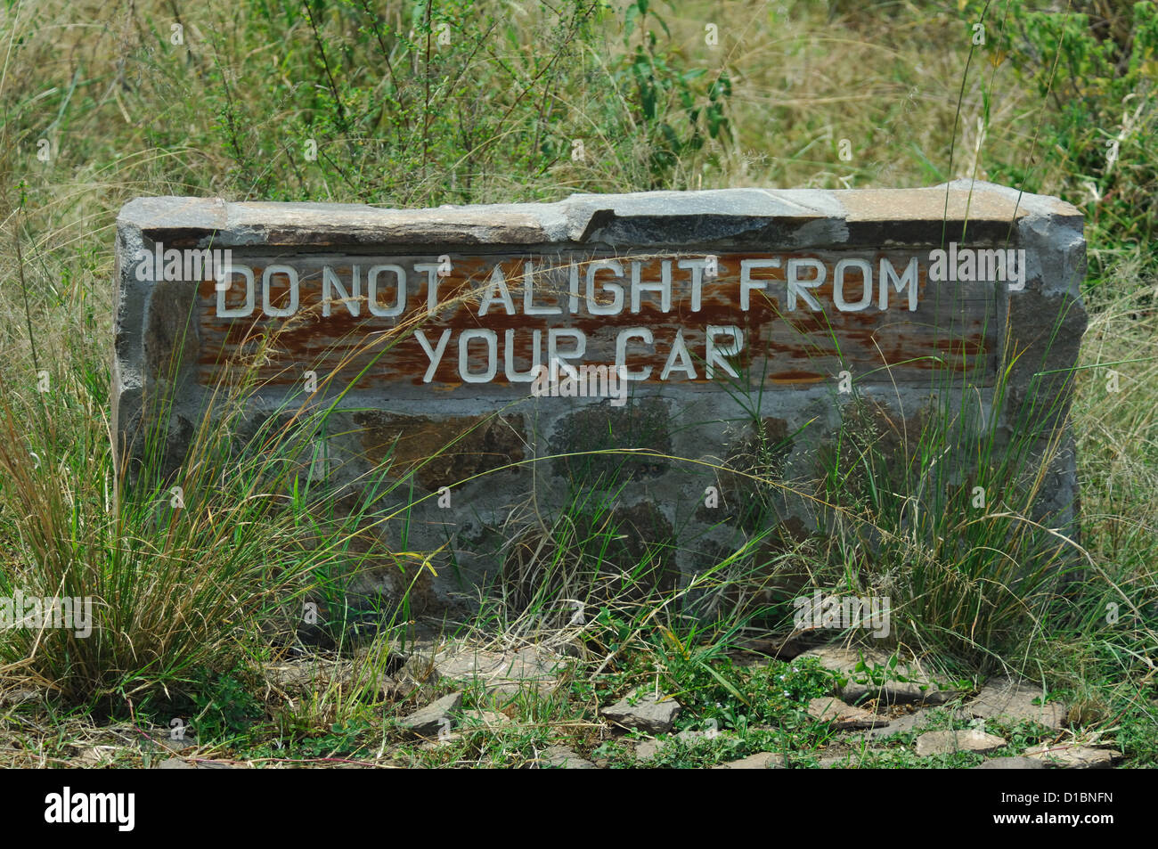Sign warning tourists of danger at the Masai Mara Reserve Kenya Africa ...