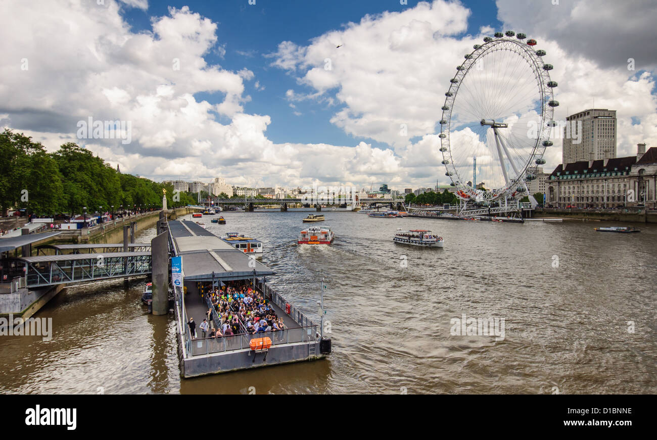 London eye and Ferry-boat terminal on the river Thames Stock Photo - Alamy