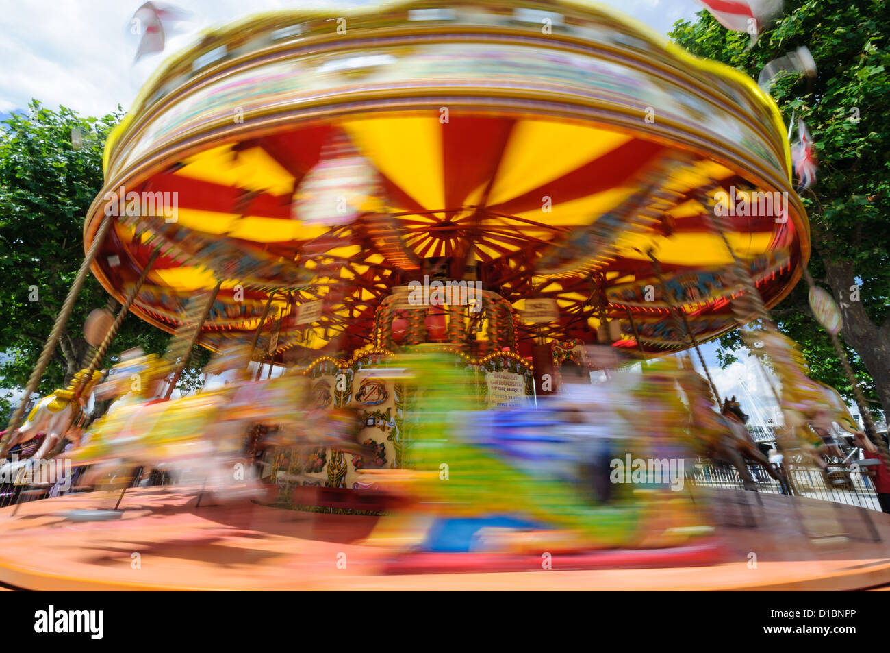 Moving Carousel with a blurred effect Stock Photo - Alamy