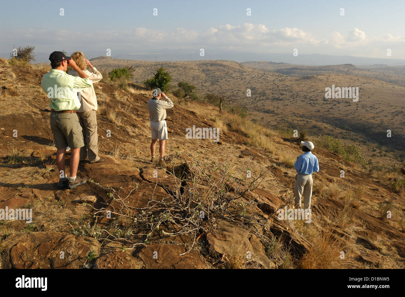 Tourists on an African game viewing safari at Lewa Downs Kenya Africa ...