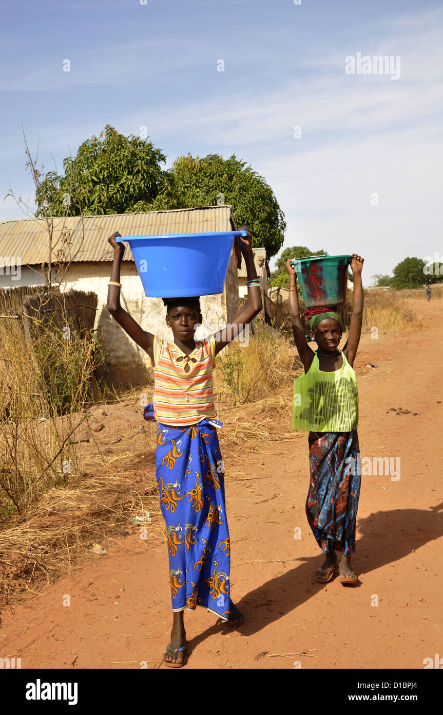 Carrying water containers hi-res stock photography and images - Alamy