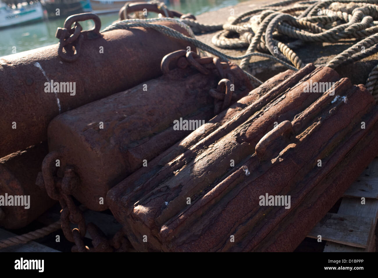 RUSTY IRON BEAMS & ROPE AT NEWLYN HARBOUR Stock Photo - Alamy