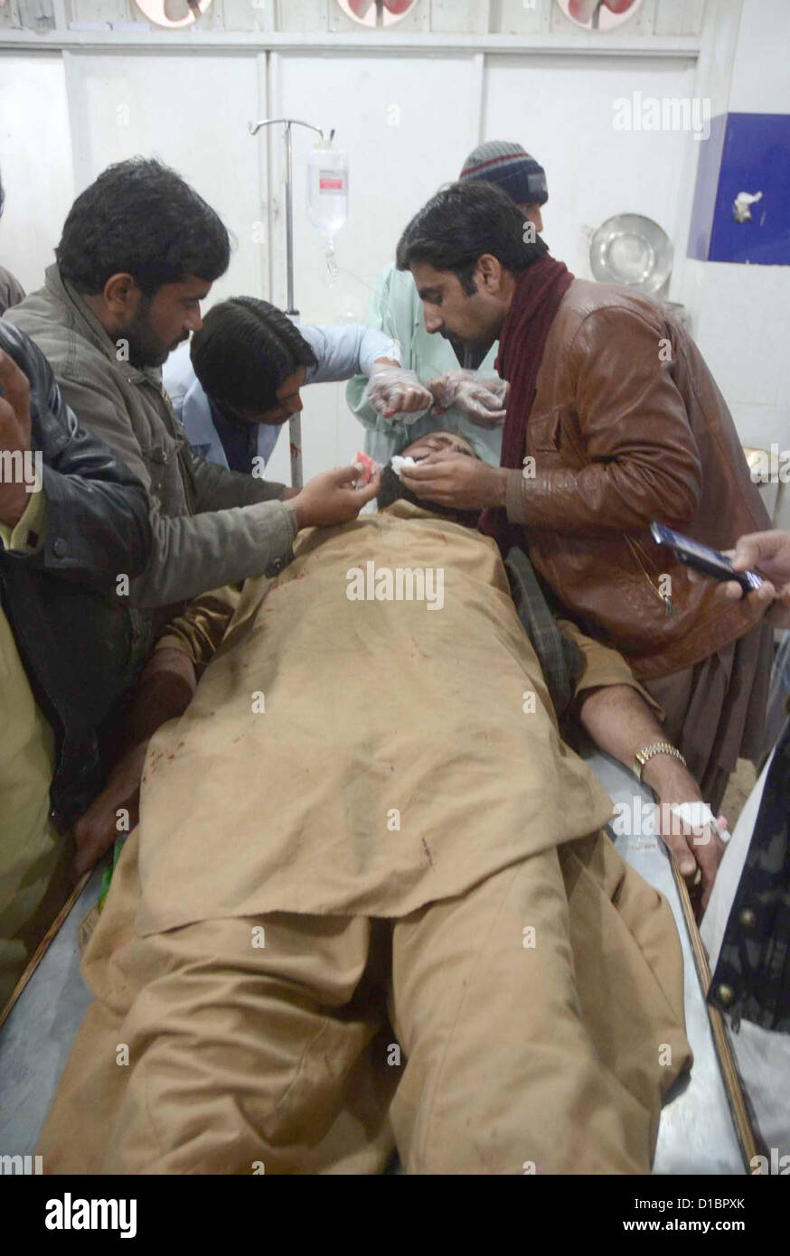 Paramedics are busy in treating victim of bomb blast at Civil Hospital ...