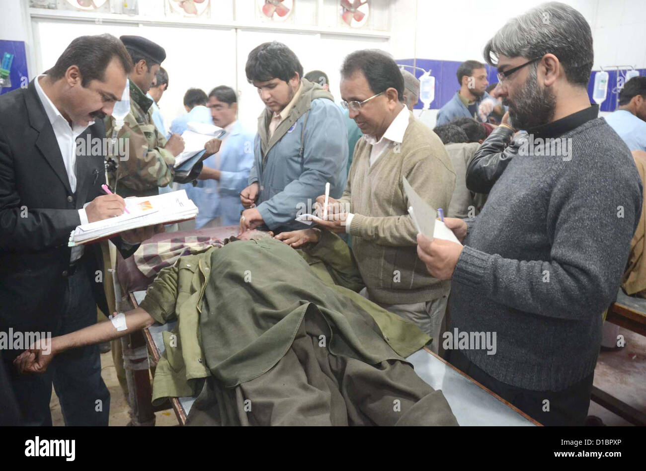 Paramedics are busy in treating victim of bomb blast at Civil Hospital ...