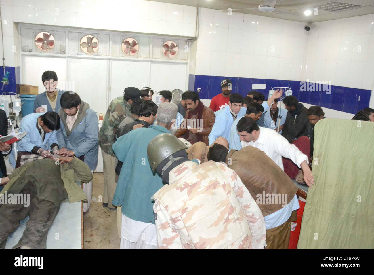 Paramedics are busy in treating victim of bomb blast at Civil Hospital ...