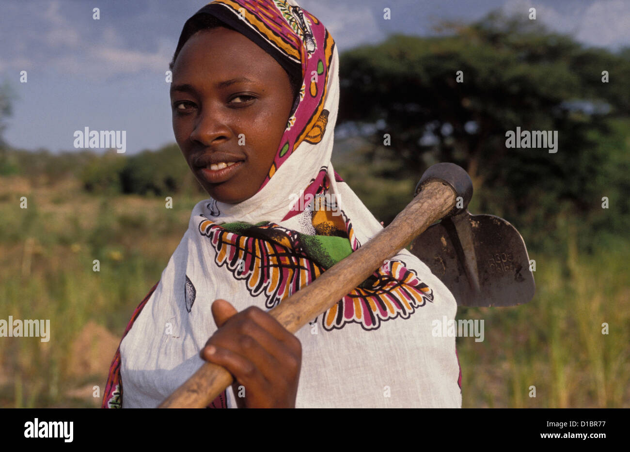 Woman with a hoe hi-res stock photography and images - Alamy