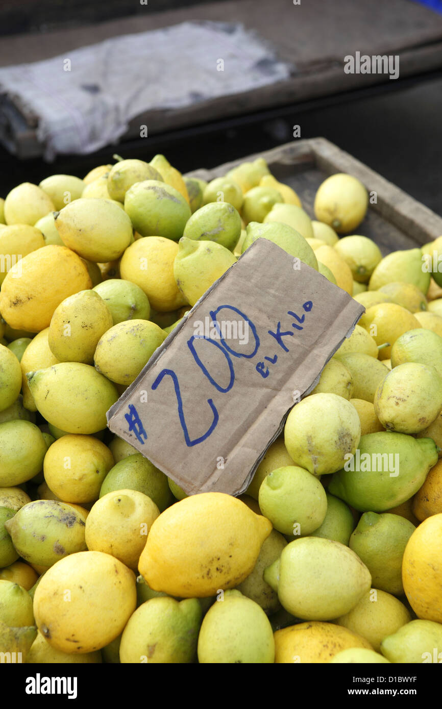 lemons for sale on a fruit stall at San Fernando street market, in the ...