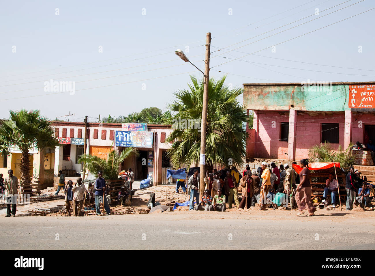 Main street in Sodo, a rift valley town in Ethiopia. Day laborer are ...