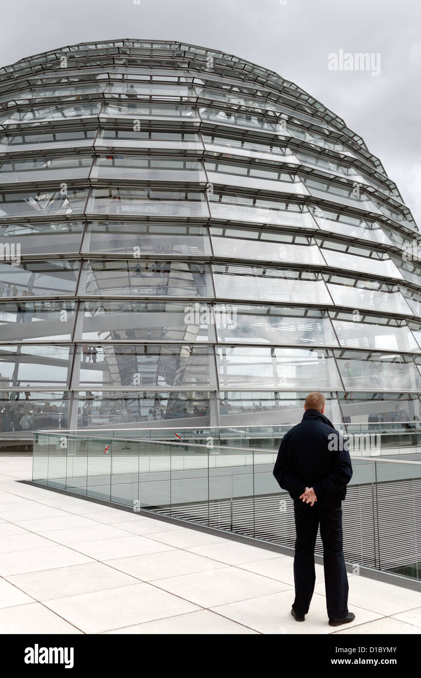 Berlin, Germany, security guard stands in front of the Reichstag dome ...