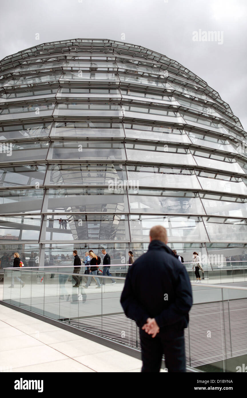 Berlin, Germany, security guard stands in front of the Reichstag dome ...