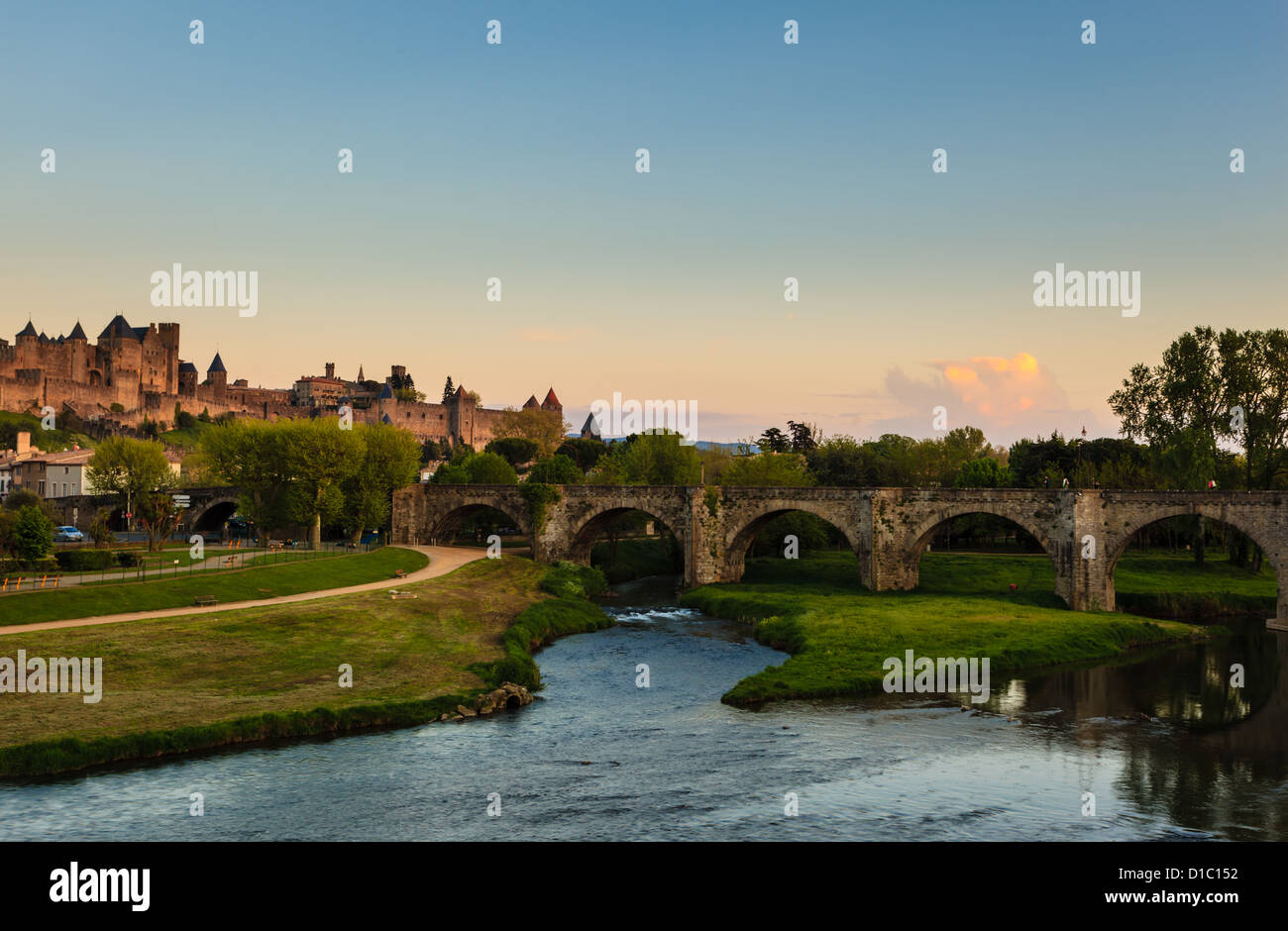 Ancient roman bridge spans wide river in old roman town of Carcassonne ...