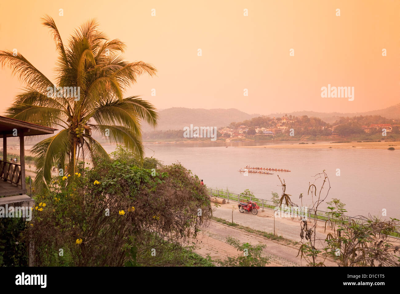 Banks of Mekong River looking towards Laos at dusk, Chiang Khong ...