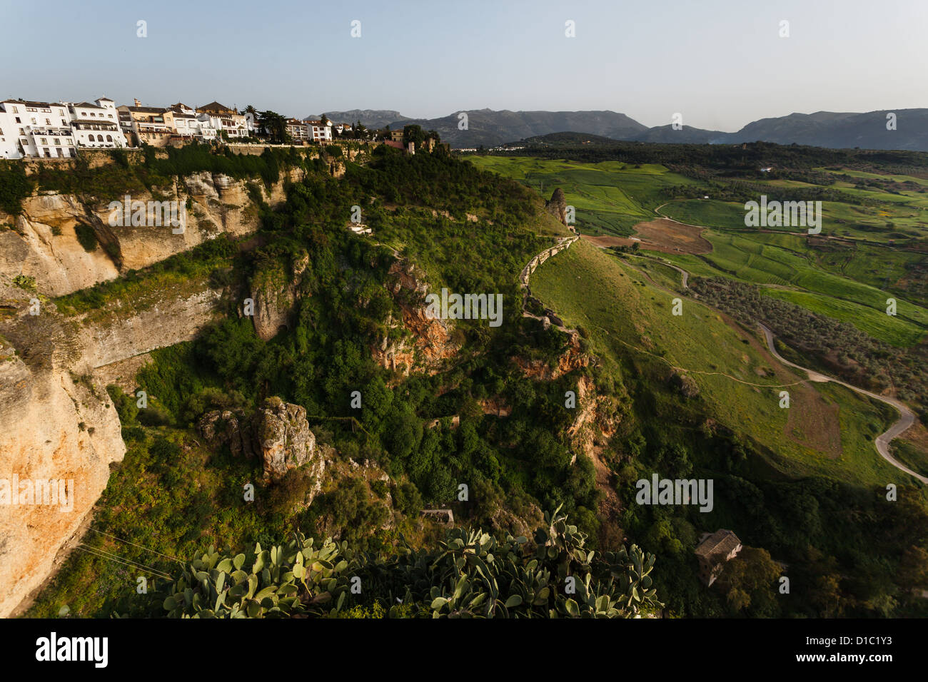 Lush spanish countryside viewed from cliffs of old town Ronda, Spain ...