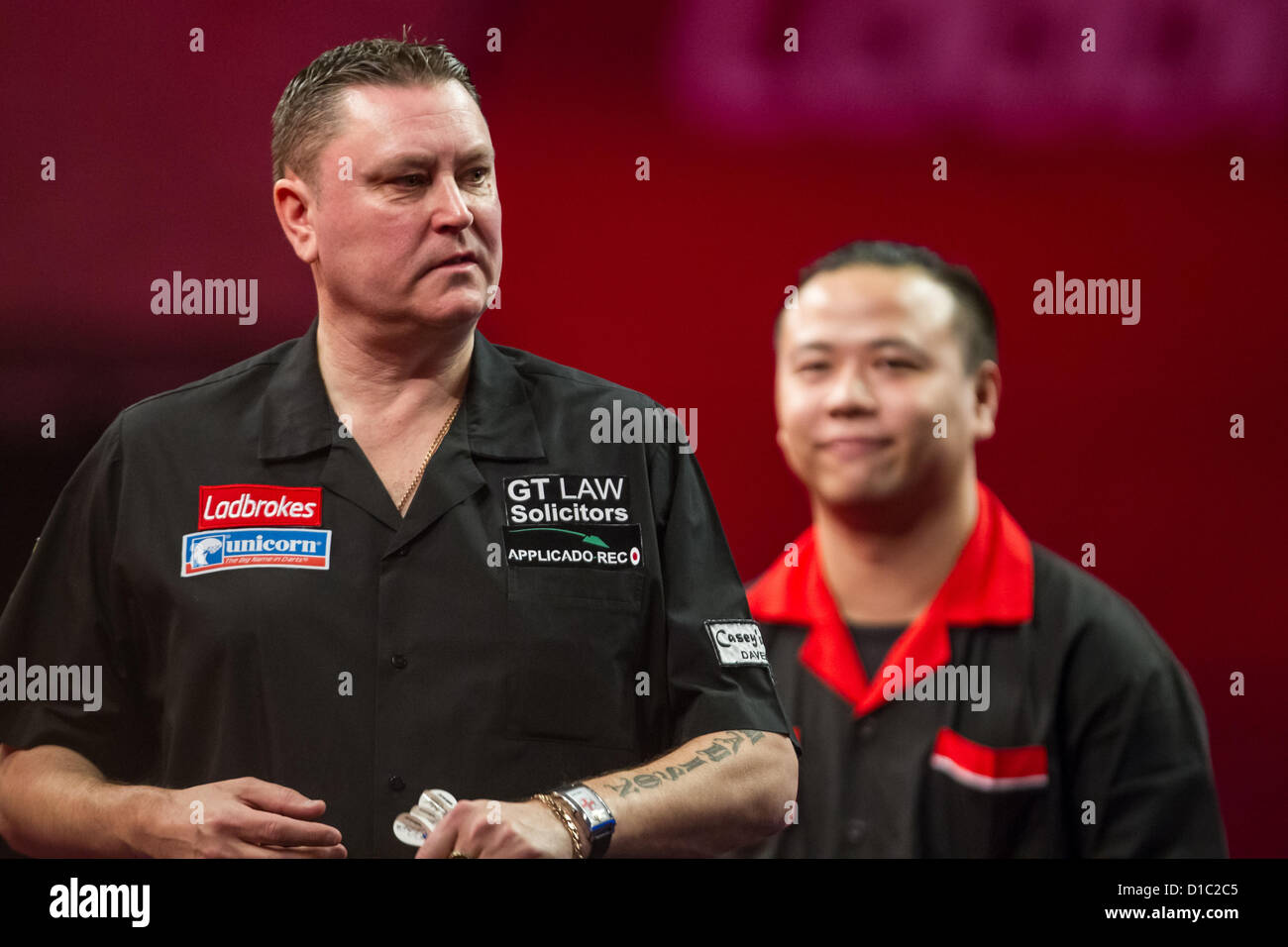14.12.2012 London, England. Kevin Painter and Leung Chung Nam in action ...
