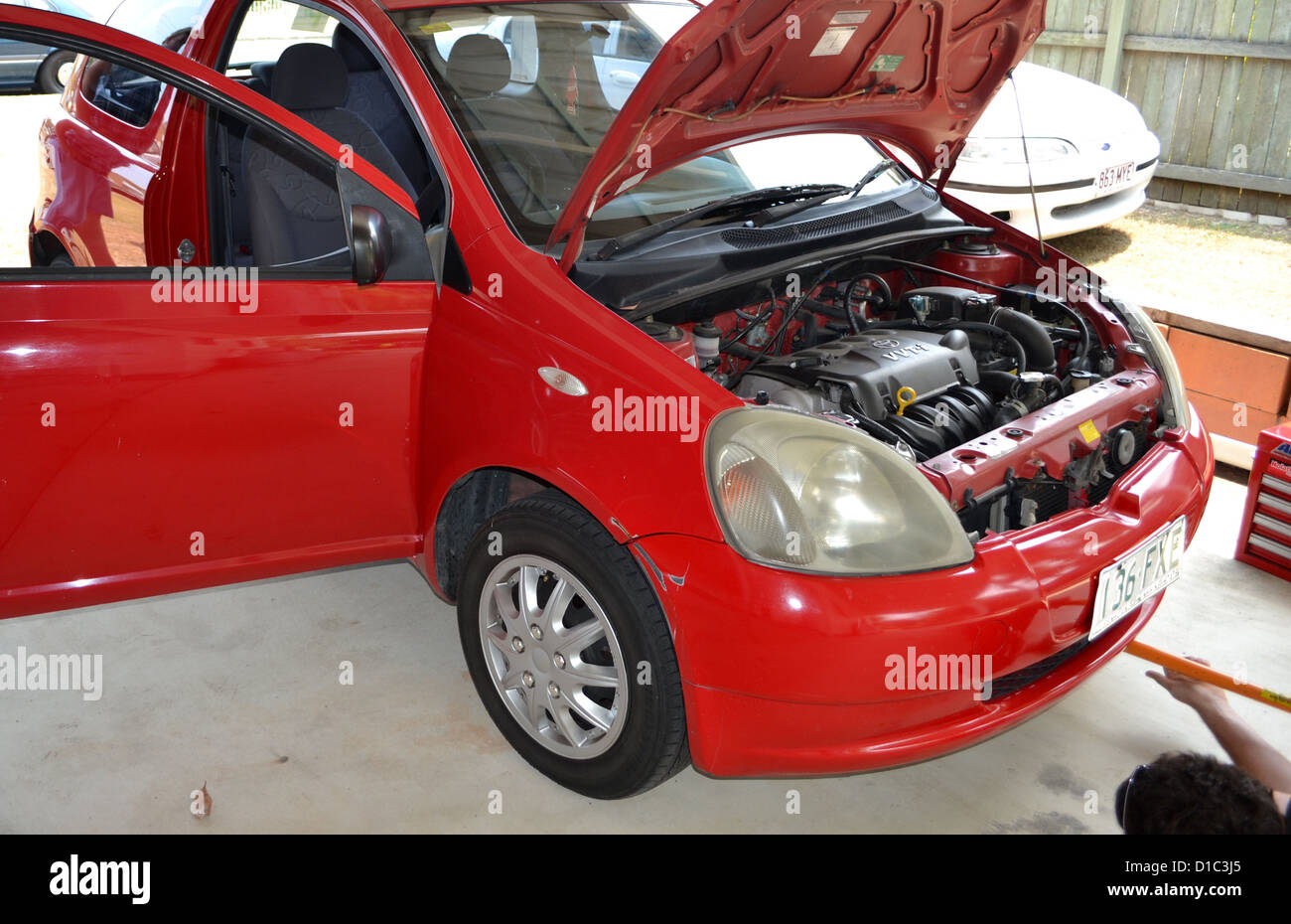 man working on car at home Stock Photo - Alamy