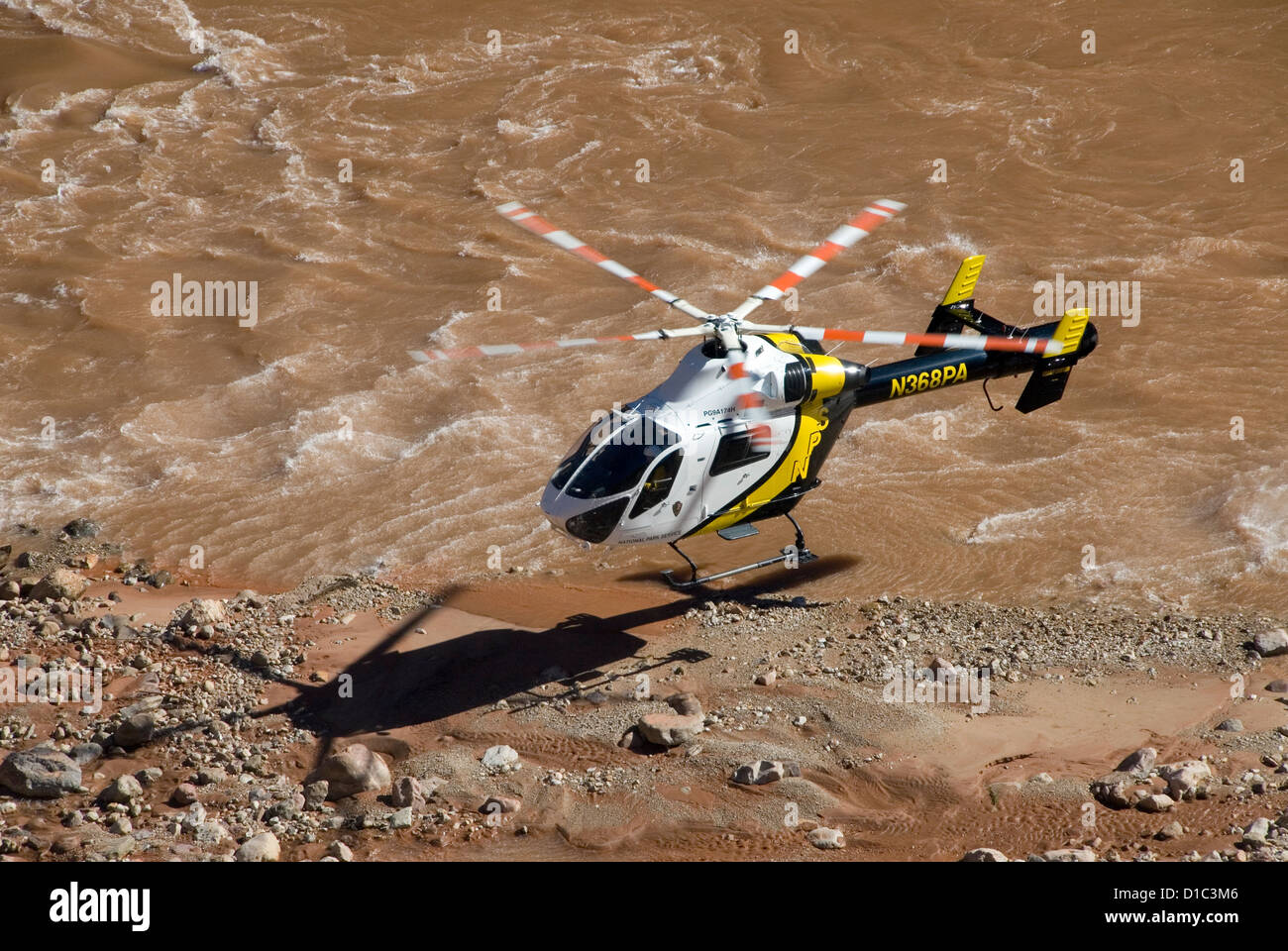 National Park Service rescue helicopter landing next to the Colorado ...