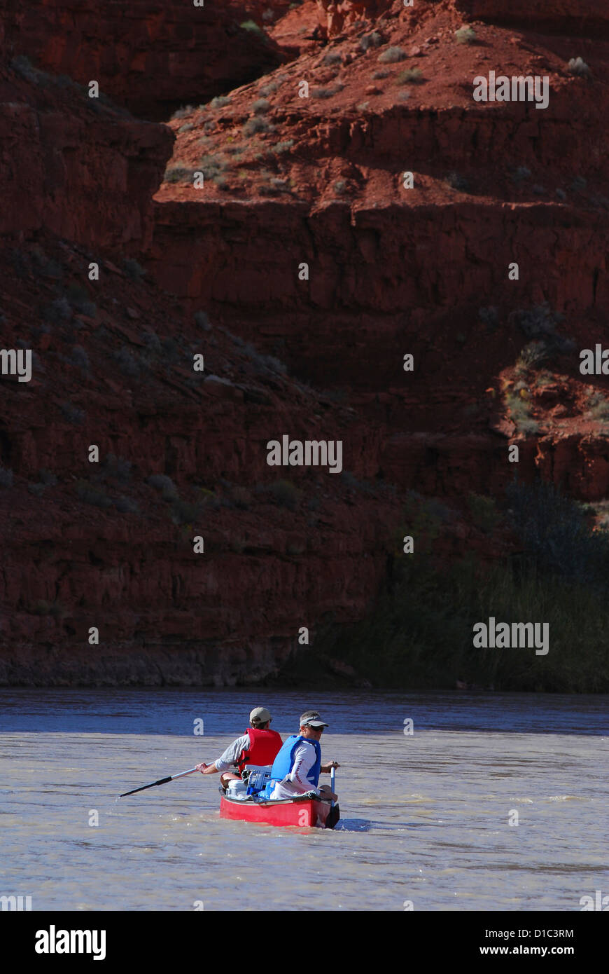 Paddling a canoe down the San Juan River in Southern Utah Stock Photo ...