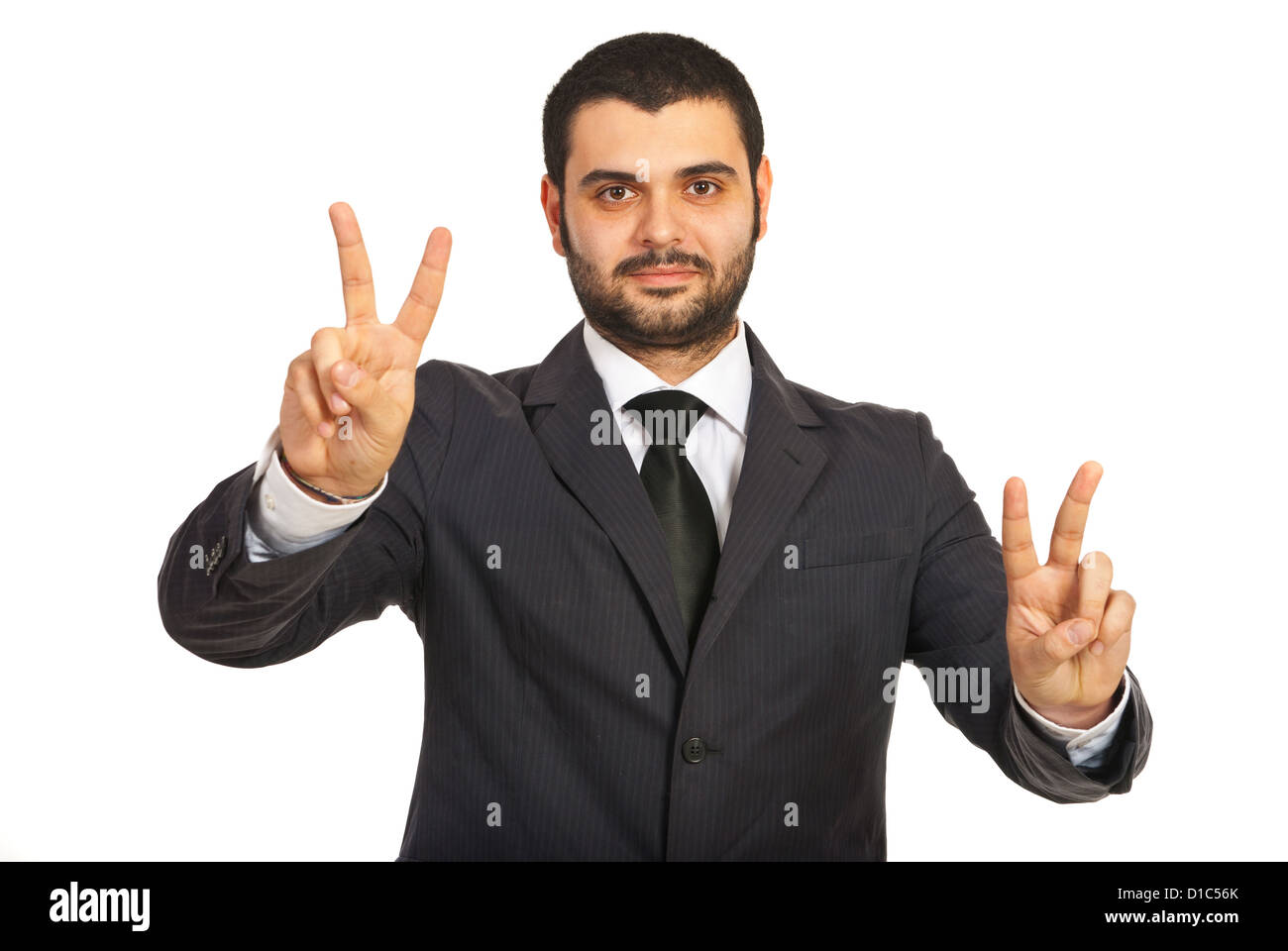 Victorious business man showing victory hands gesture isolated on white ...