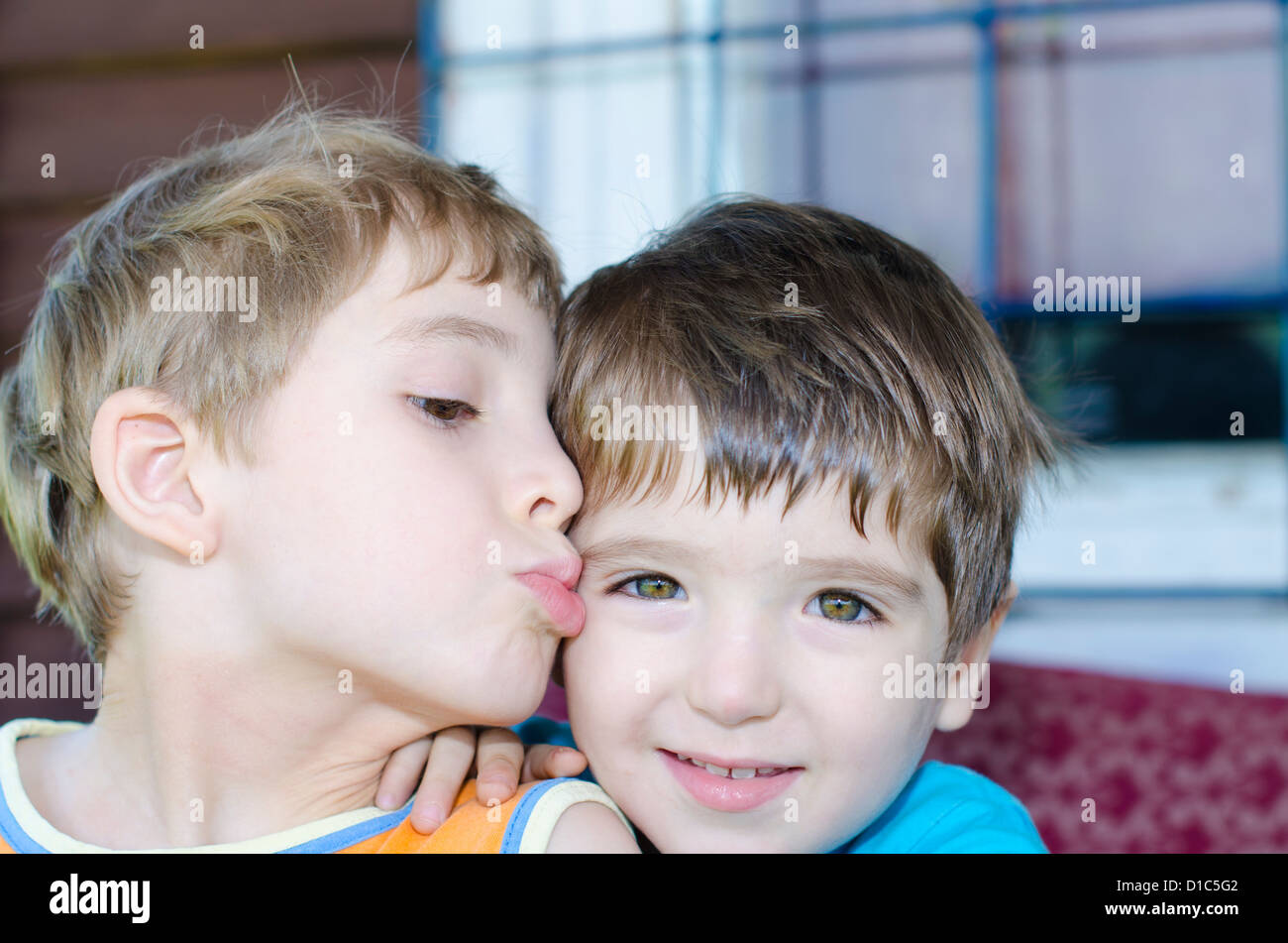 Two Brothers on a old porch Stock Photo - Alamy