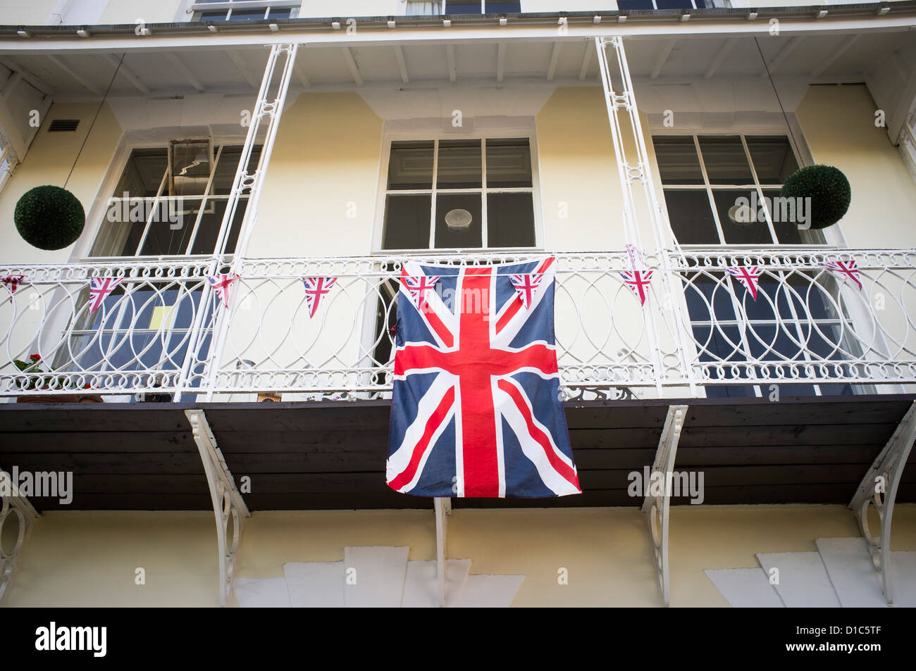 Union Jack flag hanging from balcony, Royal York Crescent, Clifton ...