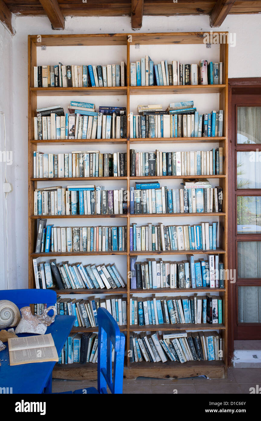 colour coordinated outdoor bookcase in holiday villa, south west Turkey ...