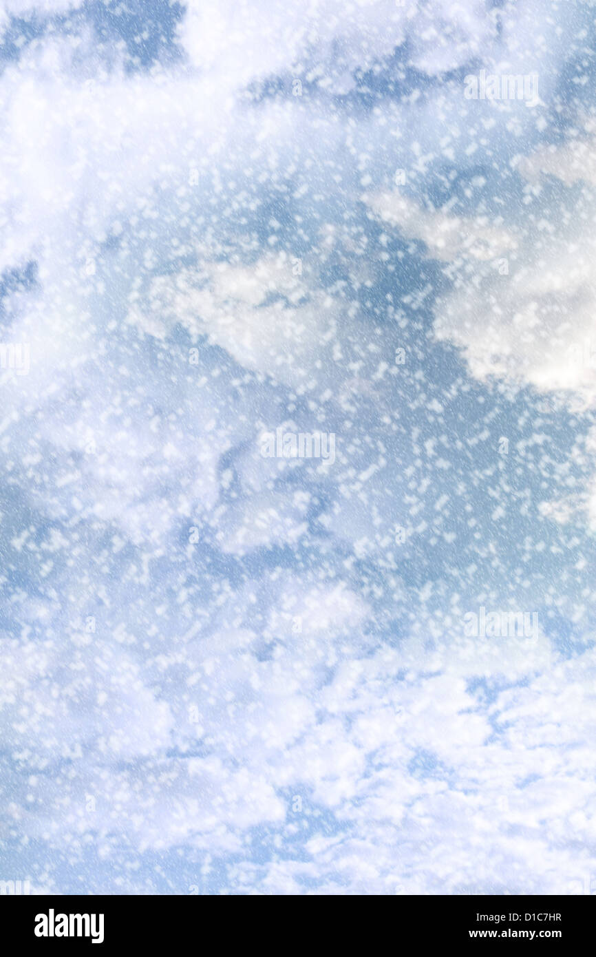 a snow storm against a cloudy background Stock Photo - Alamy