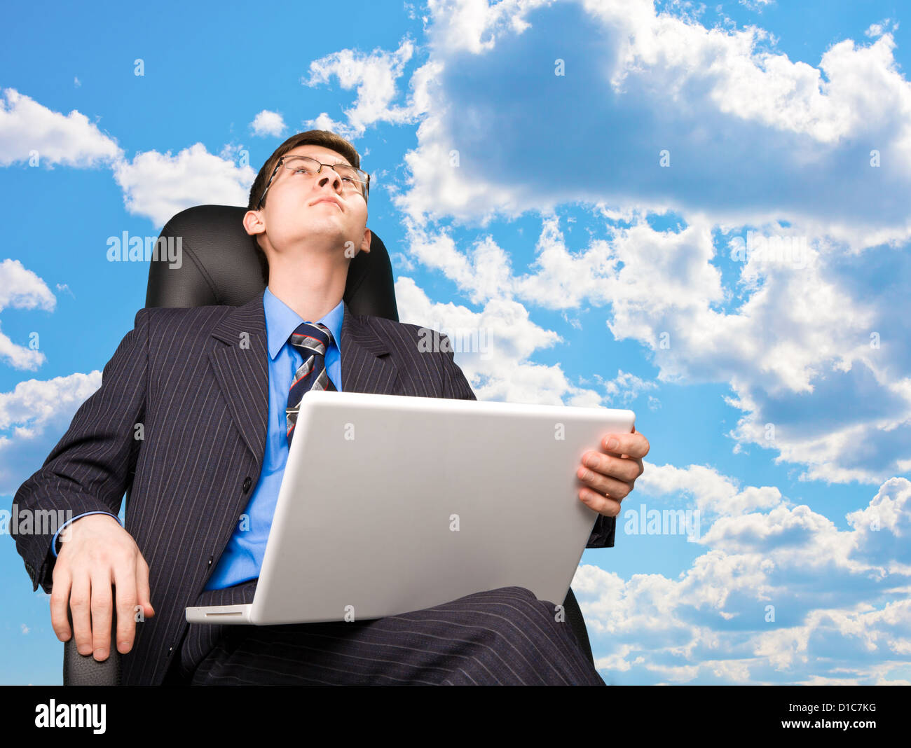Office worker sitting in office chair at sky background Stock Photo - Alamy