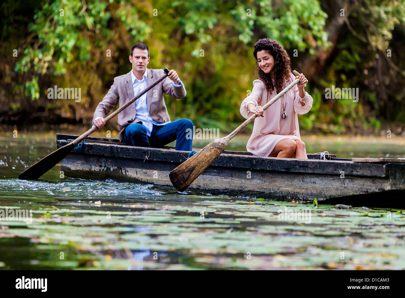 Couple in the boat Stock Photo - Alamy