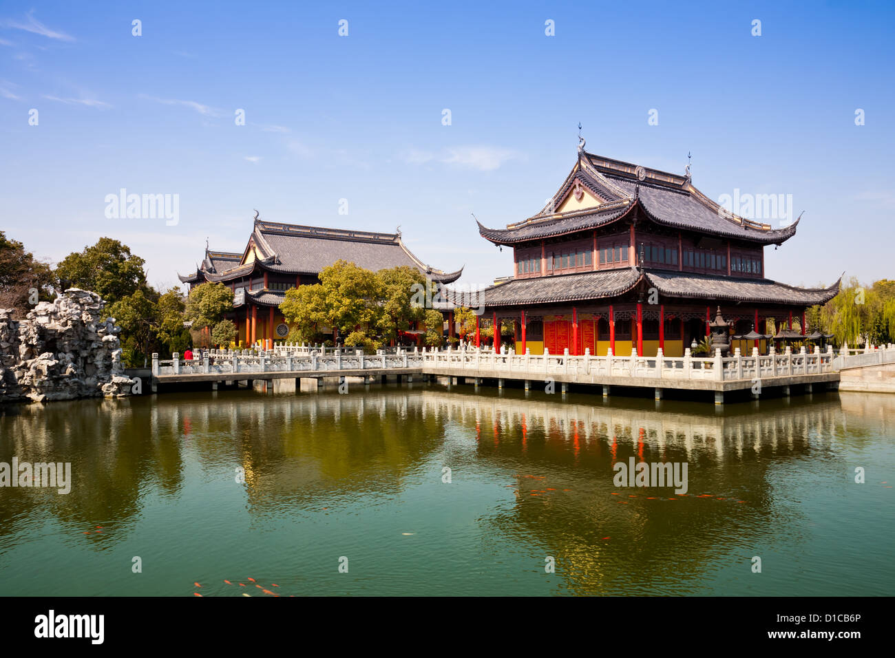 Chinese buddhist temple with peaceful pond named Quanfu Temple, located ...