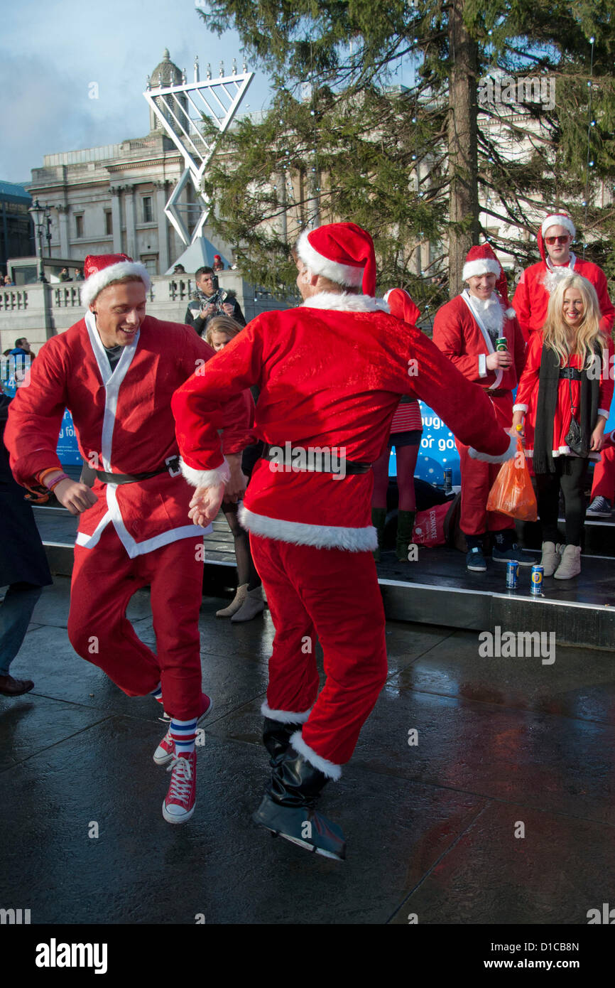 Dancing santas hi-res stock photography and images - Alamy