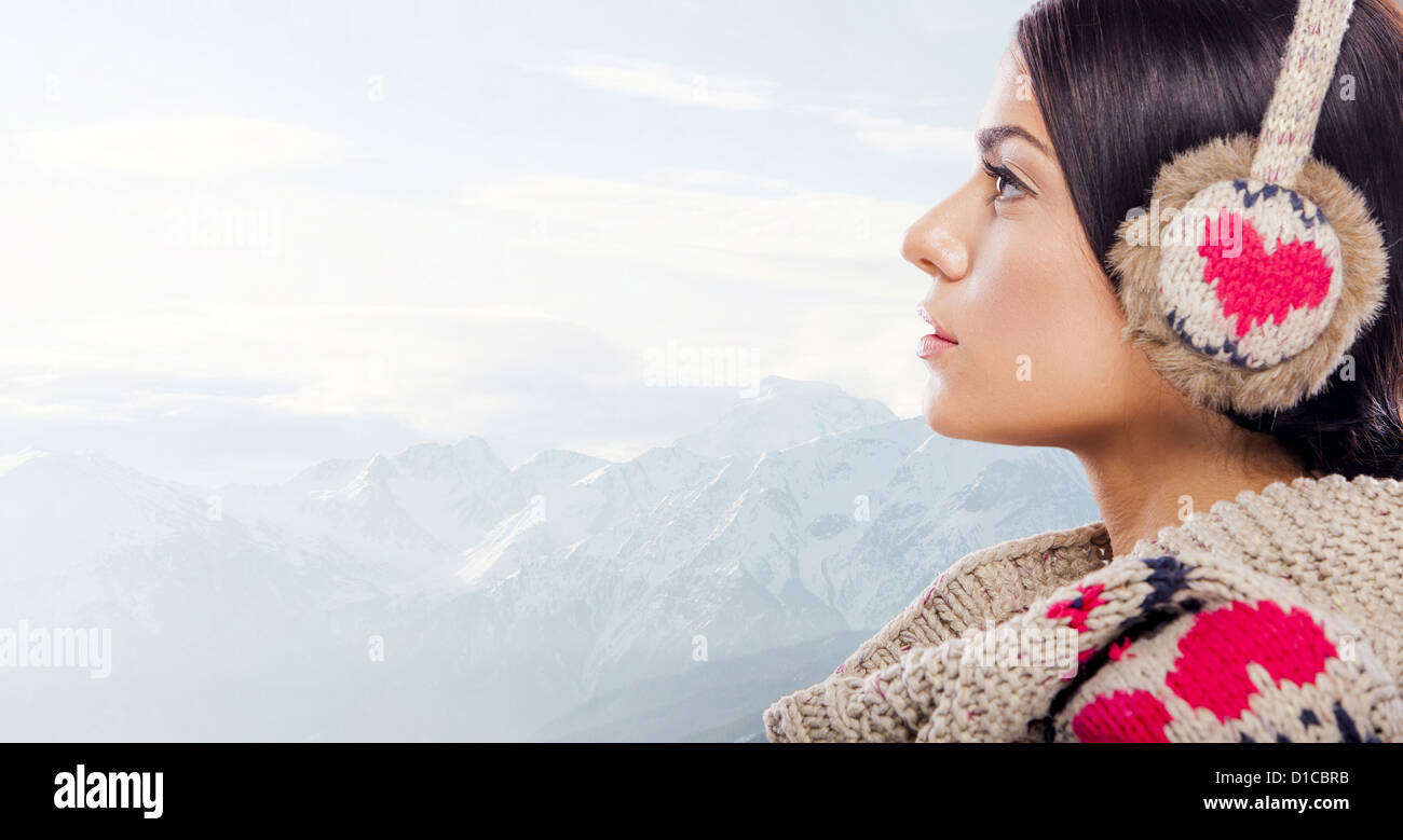 Young woman in winter clothes on the mountain Stock Photo - Alamy