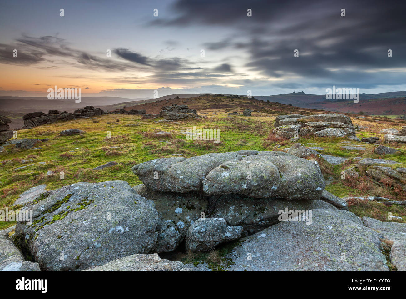Granite rocks on the moorland at Hayne Down view towards Haytor Rocks ...
