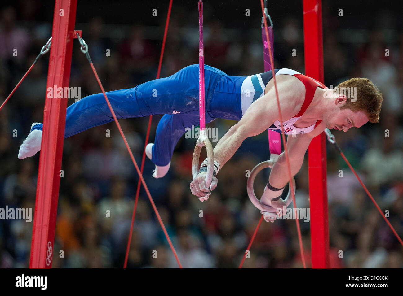 Daniel Purvis (GBR) competing on the rings during the Men's Individual ...