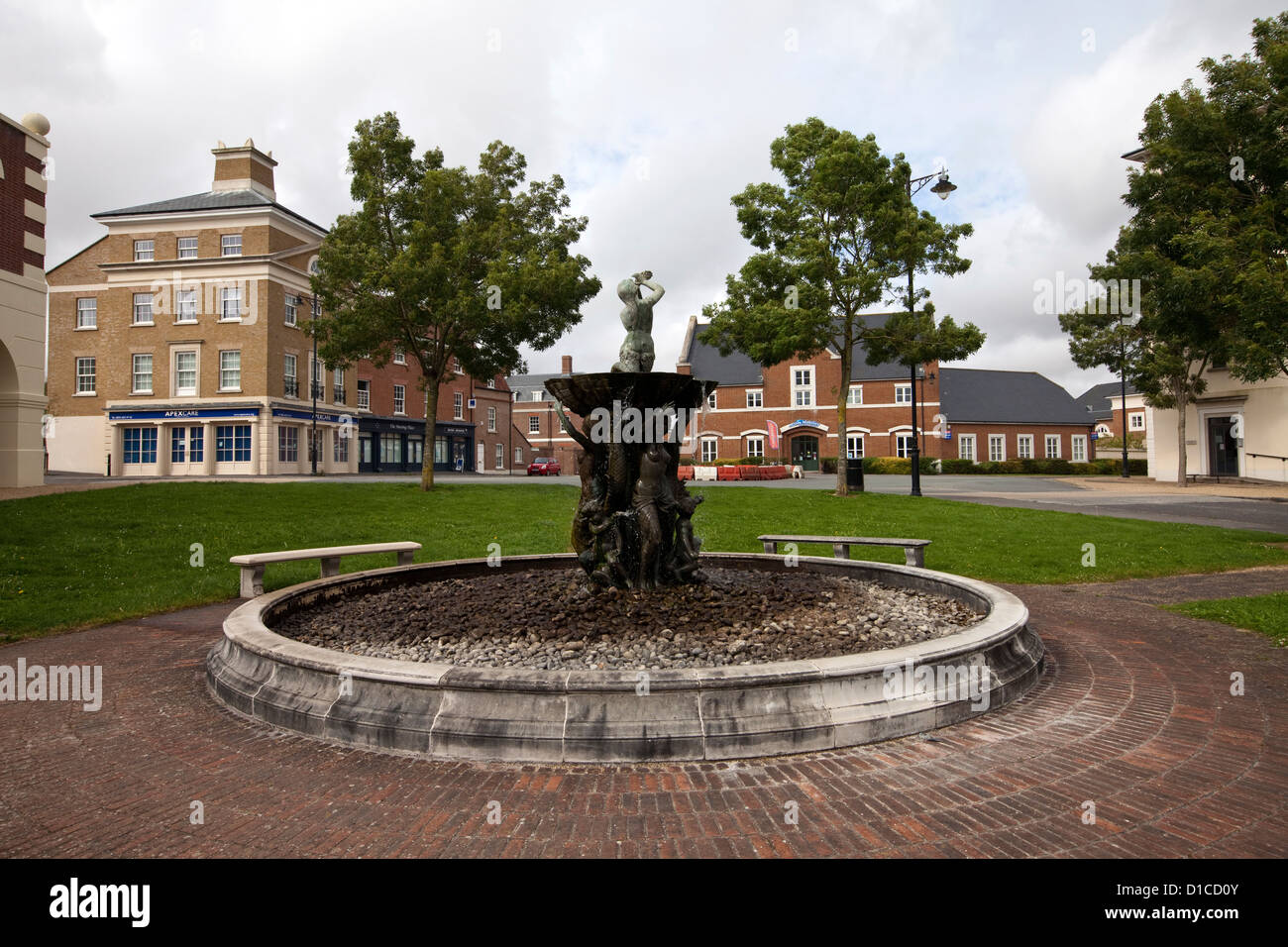 A traditionally styled fountain in Poundbury, Dorset. The town is ...